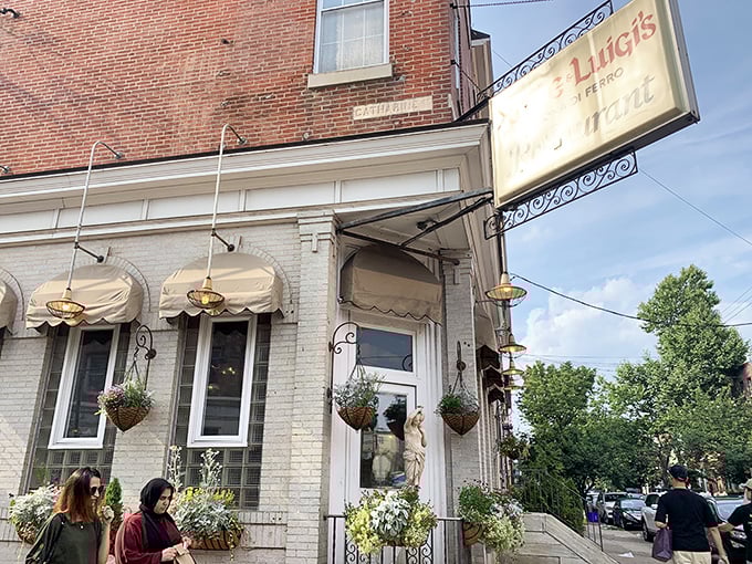 The classic white brick façade and yellow "Dante & Luigi's" sign have welcomed hungry Philadelphians for generations, promising Italian comfort within.