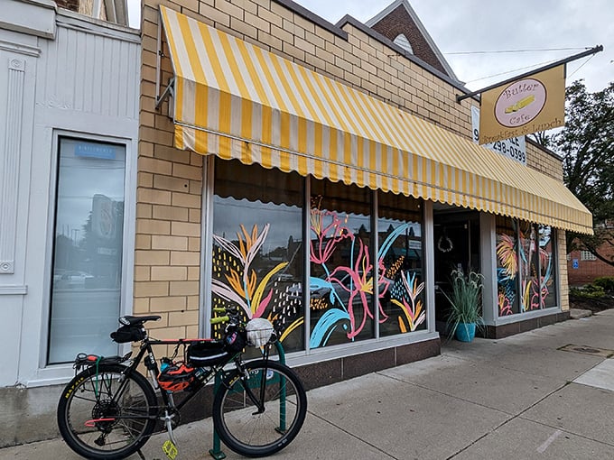 That cheerful yellow and white awning isn't just decoration—it's a breakfast beacon calling you home to Butter Cafe in Dayton.