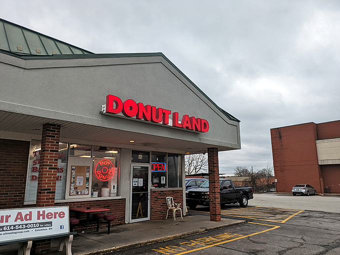 The red brick facade and cheerful signage promise sweet treasures within this Brunswick neighborhood gem.