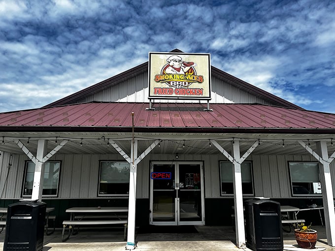 The unassuming exterior of Smoking Aces BBQ promises little but delivers big—a classic case of "don't judge a barbecue joint by its metal roof."