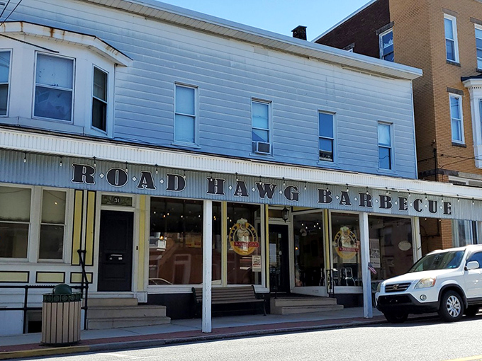 The cartoon pig chef on Road Hawg's storefront isn't just cute—he's making a bold promise that this Dillsburg joint takes its barbecue seriously.