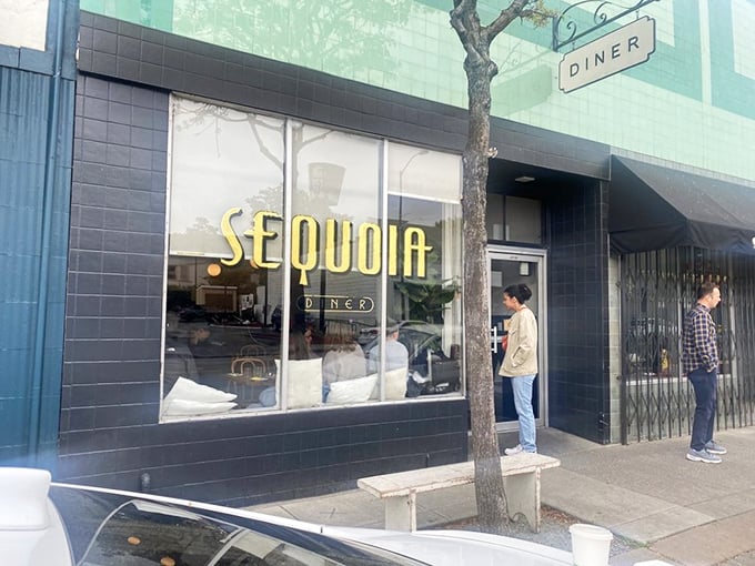 Art Deco meets morning magic – Sequoia Diner's mint-green facade stands proudly on Oakland's MacArthur Boulevard, promising breakfast revelations within those tiled walls.