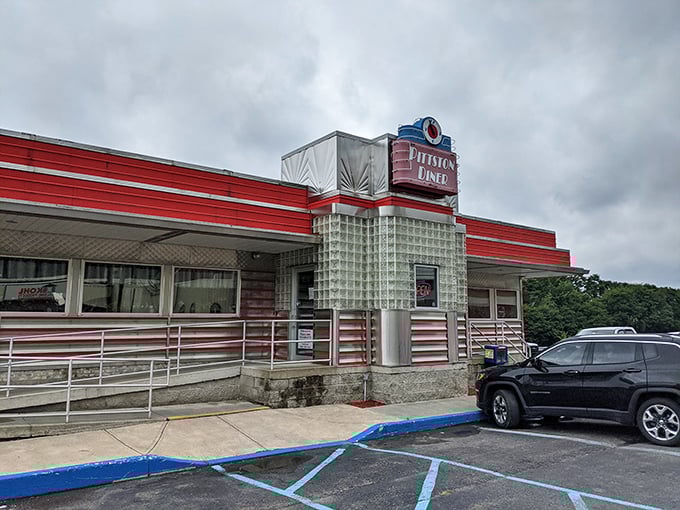 The classic red and chrome exterior of Pittston Diner stands like a time machine to the 1950s, beckoning hungry travelers with nostalgic charm.