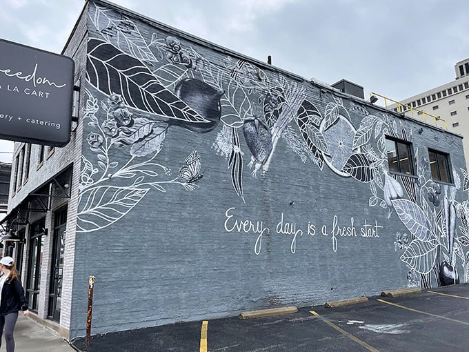 The blue-gray building with its elegant botanical mural isn't just eye-catching—it's practically whispering "come inside and eat something wonderful."