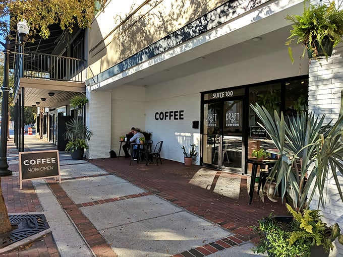 The minimalist exterior of Craft & Common speaks volumes – simple "COFFEE" signage against white brick says, "We don't need to shout about how good we are."