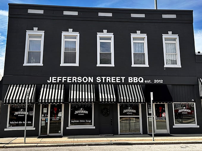 The sleek black exterior with crisp white trim isn't just eye-catching—it's a beacon of barbecue hope in small-town Indiana.