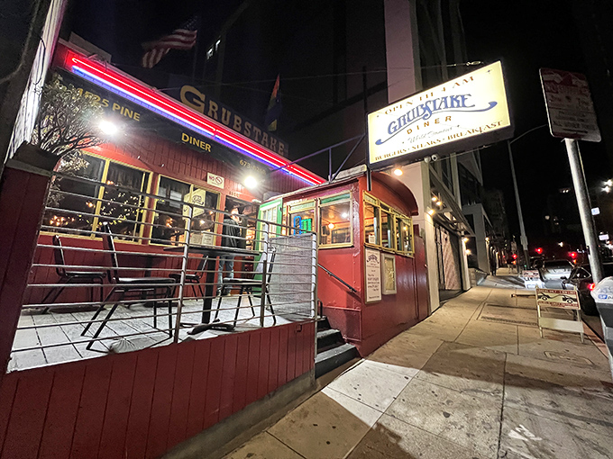 The neon-lit exterior of Grubstake Diner glows like a beacon for night owls, promising comfort food salvation in a converted railroad car that's pure San Francisco charm.