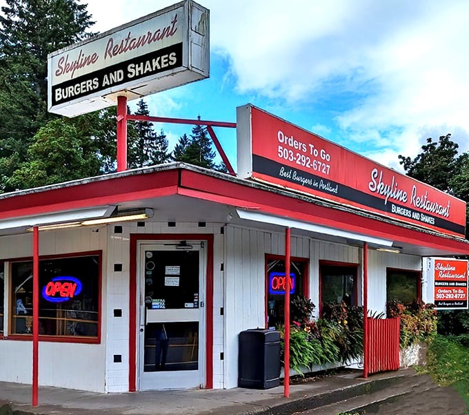 The classic red and white exterior of Skyline Restaurant stands as a beacon of burger perfection, promising simple pleasures done extraordinarily well.