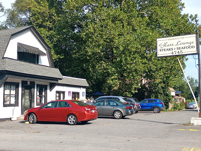 The unassuming exterior of Glass Lounge in Harrisburg hides culinary treasures within. Classic white building, modest signage—the perfect disguise for burger greatness.