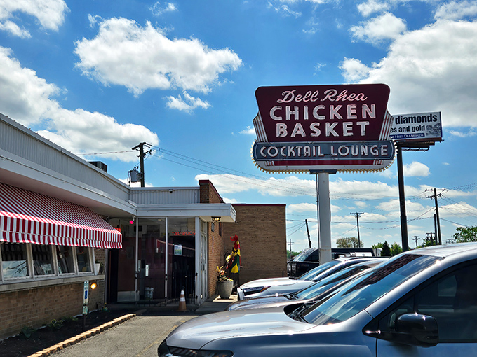 The iconic red and white awnings of Dell Rhea's welcome hungry travelers like a beacon of fried chicken salvation along Route 66.