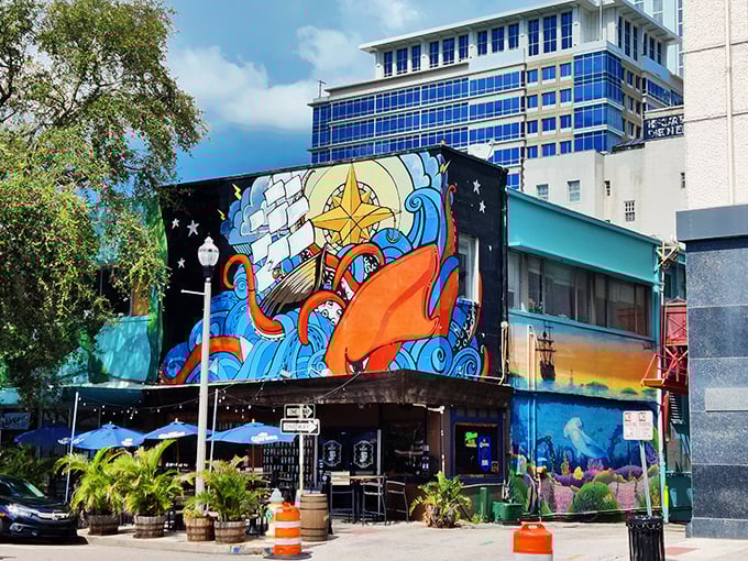 The vibrant nautical mural adorning The Galley's exterior isn't just art—it's a colorful promise of the seafood treasures waiting inside.