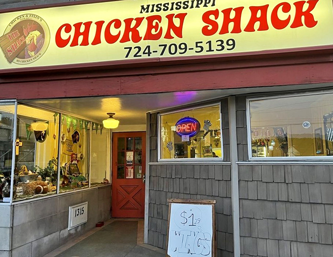 The unassuming storefront of Mississippi Chicken Shack beckons with its bold red sign and humble "$1 Wings!" sidewalk board—culinary treasures often hide in plain sight.
