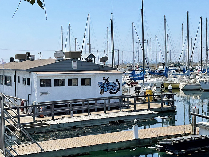 Floating serenely among sailboats in Leeward Bay Marina, The Chowder Barge isn't just a restaurant—it's a maritime adventure waiting to happen.