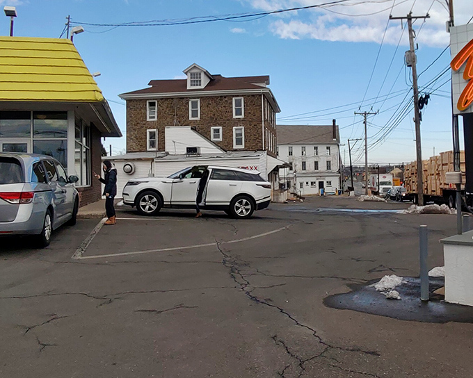 The unassuming exterior of Yum Yum Bake Shops stands like a beacon of sweetness in Colmar, where Pennsylvania's best-kept secret has been hiding in plain sight.