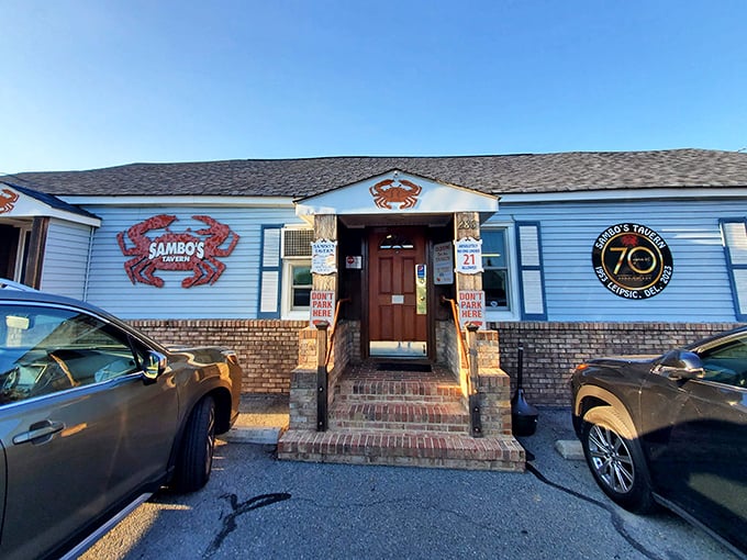 The iconic blue exterior with its bold red crab logo promises seafood treasures within – Delaware's ultimate "come as you are" dining destination.