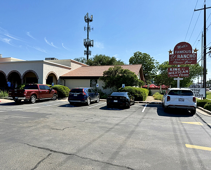 The unassuming exterior of Matt's El Rancho belies the culinary treasures within. That iconic sign has been guiding hungry Texans to enchilada nirvana since 1952.