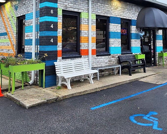 The colorful exterior of Early Bird Diner is like a rainbow that crashed into a building—in the best possible way. Charleston's most cheerful restaurant beckons hungry visitors.