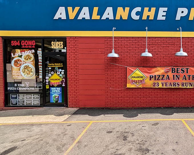 The bright red brick exterior of Avalanche Pizza stands as a beacon of hope for the hungry in Athens, Ohio. Eight-time pizza champions don't need fancy facades.