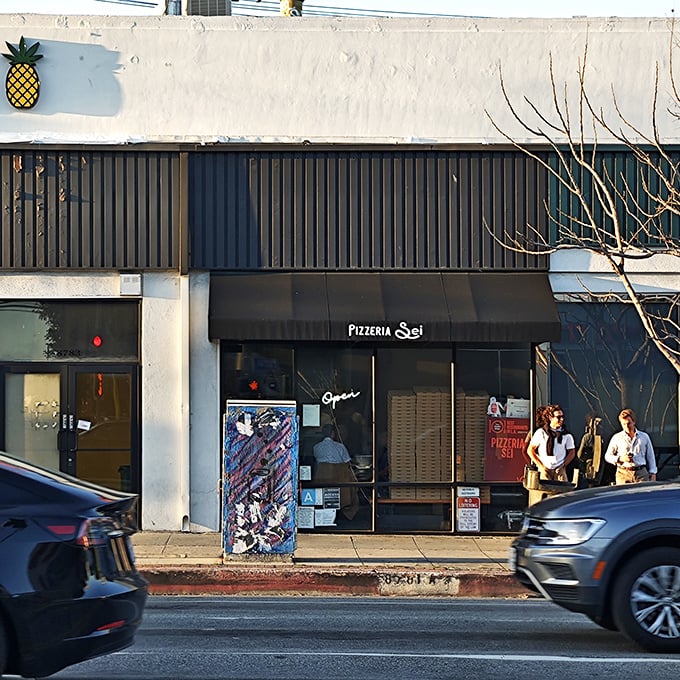 Sleek, modern, and unassuming from the outside—Pizzeria Sei's exterior belies the pizza paradise waiting within. The best treasures often hide in plain sight.
