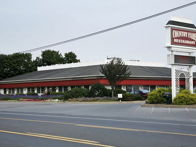 Those iconic red awnings welcome you like an old friend's smile – the first hint that comfort food paradise awaits inside.
