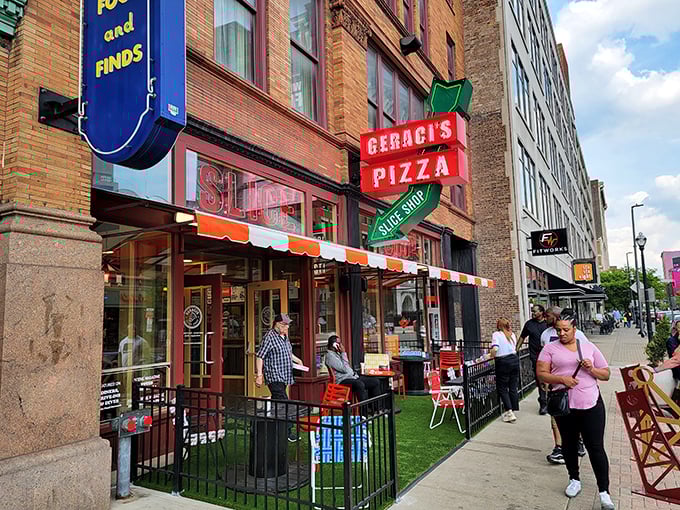 The iconic red and green Geraci's sign beckons pizza pilgrims like a lighthouse for the cheese-obsessed. Downtown Cleveland never smelled so good.