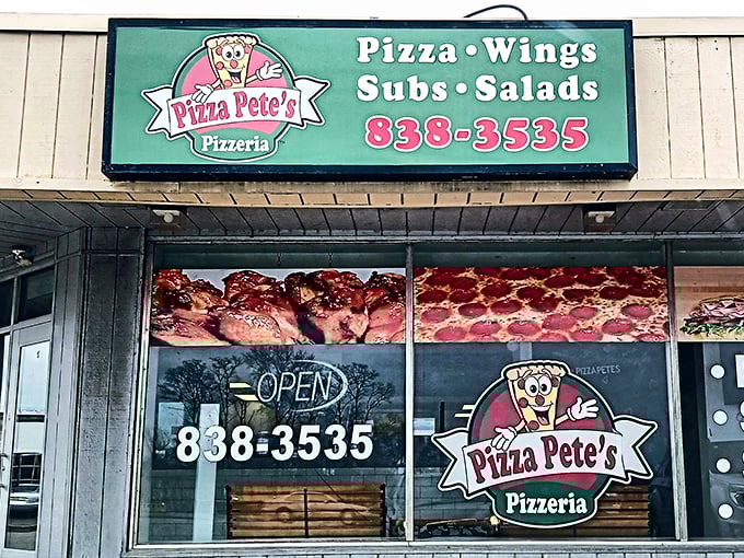 The green and white beacon of Pizza Pete's stands proud in Erie, where locals know that behind that cheerful cartoon mascot lies some seriously good pizza.