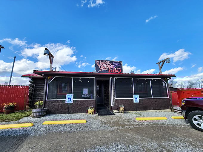 The unassuming exterior of Uncle Beth's BBQ hides a smoky paradise within. That little bulldog seems to know what treasures await inside.