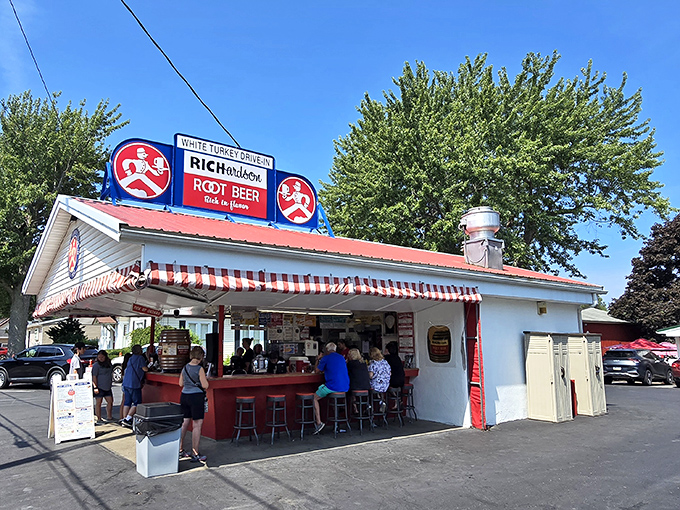 Time travel doesn't require a DeLorean—just a drive to this classic red-and-white awning where Richardson Root Beer and summer memories flow freely.