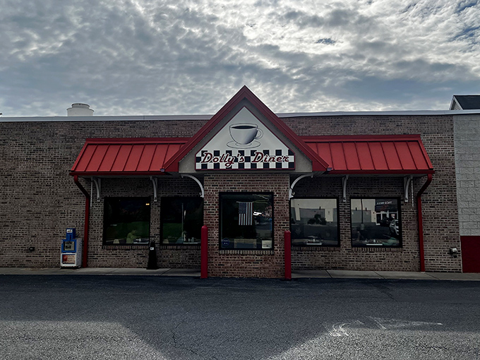 The classic brick façade and cherry-red roof of Dolly's Diner stands like a beacon of breakfast hope on East Third Street in Williamsport.