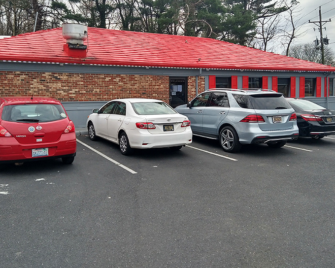 The packed parking lot tells you everything you need to know. Route 3 Diner's modest exterior hides Delaware's breakfast paradise within those red-roofed walls.