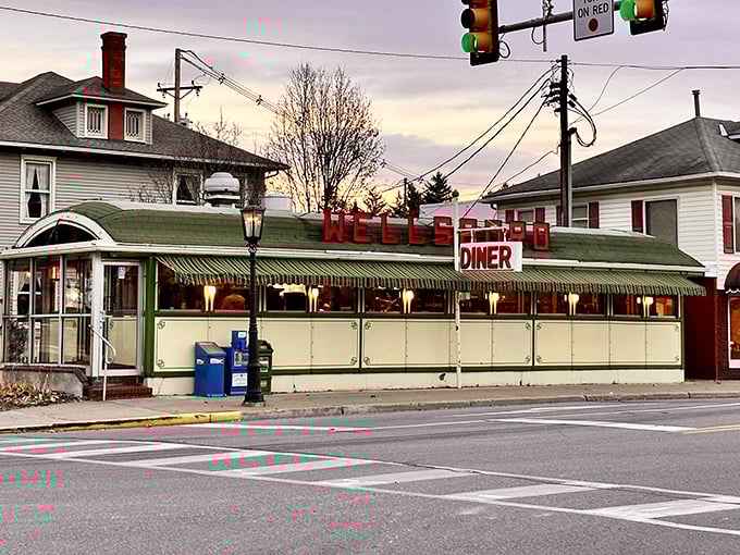 The gleaming stainless steel exterior of Wellsboro Diner isn't trying to be retro—it's the real deal, a genuine slice of Americana standing proudly on Main Street.