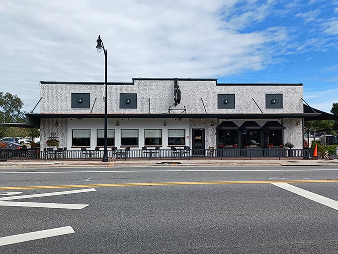 The unassuming façade of The Ravenous Pig belies the culinary wonderland within. Like finding a secret passage to flavor country in Winter Park's upscale neighborhood.