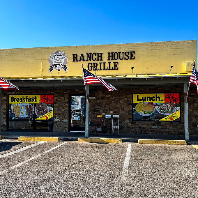 The stone facade and American flags of Ranch House Grille stand as a beacon for hungry Phoenicians, promising hearty meals that'll fuel desert adventures.