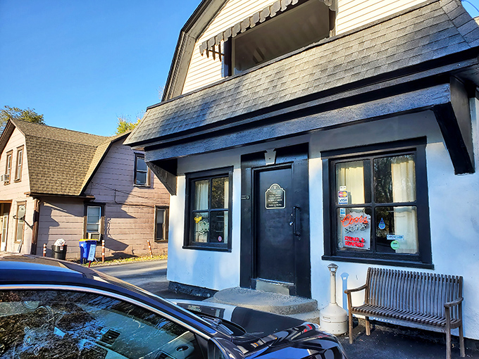 The unassuming exterior of The Glass Lounge stands as a testament to the old wisdom: never judge a steakhouse by its facade. Culinary treasures await inside.