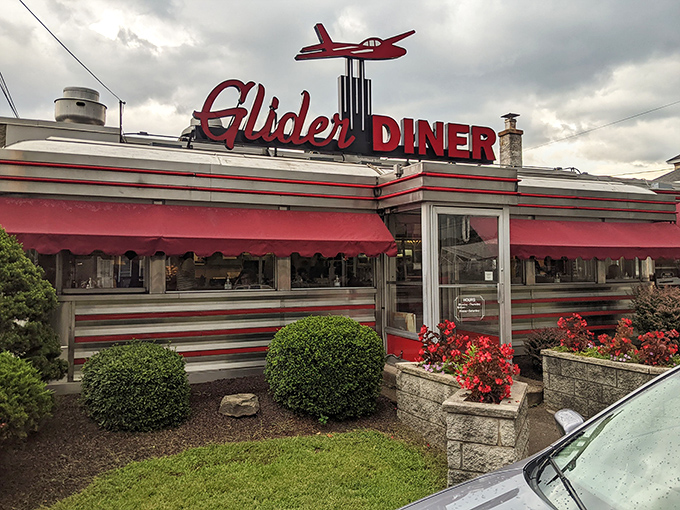 The iconic red glider airplane perched atop this classic Scranton diner isn't just decoration—it's a beacon calling hungry travelers home.