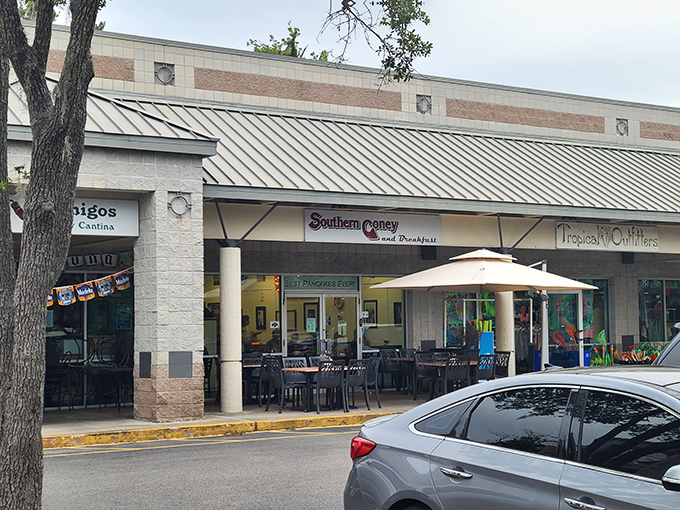 The unassuming storefront promises big flavor. That pink flamingo is just a hint of the personality waiting inside Southern Coney and Breakfast.