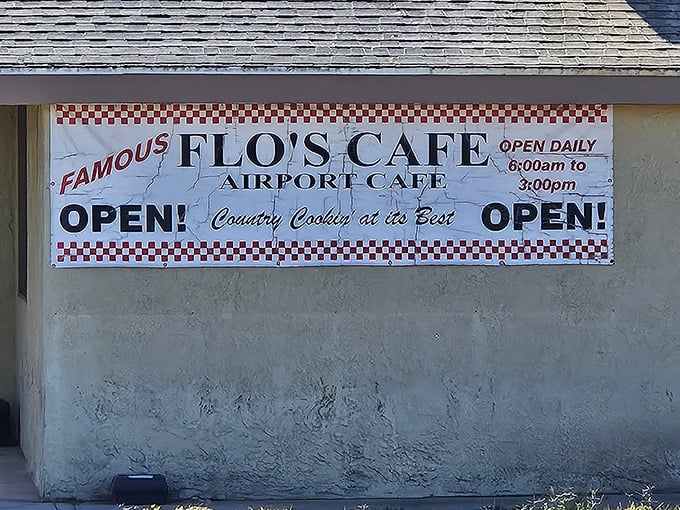 The unassuming exterior of Flo's Airport Cafe promises "Country Cookin' at its Best" – a claim that proves deliciously accurate once you step inside.