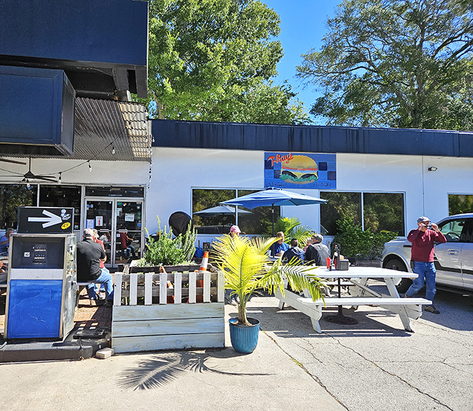 The holy grail of burger joints doesn't need neon signs or valet parking—just a converted gas station, picnic tables, and the promise of greatness within.