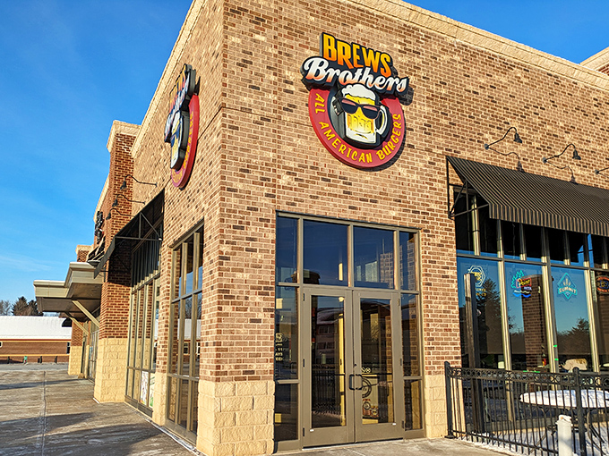 The brick exterior of Brews Brothers welcomes hungry travelers like a beacon of hope for empty stomachs. That smiling beer mug logo practically winks at you.