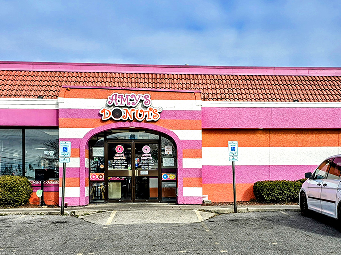 The candy-striped exterior of Amy's Donuts looks like Willy Wonka designed a building. Even from the street, it promises sugary adventures await inside.