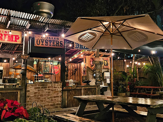 The vintage bicycle out front isn't just decoration—it's a time machine transporting you to Old Florida's golden age of seafood shacks.