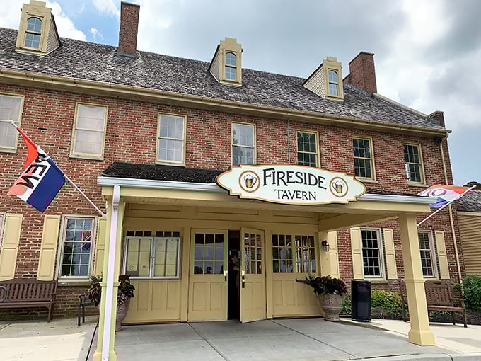The historic brick façade of Fireside Tavern stands proudly in Strasburg, welcoming hungry travelers with its colonial charm and promise of culinary delights within.