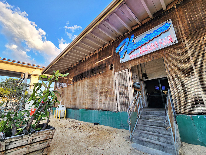The unassuming wooden exterior of Hometown Barbecue is like a secret handshake – only those in the know recognize the smoky treasures waiting inside.