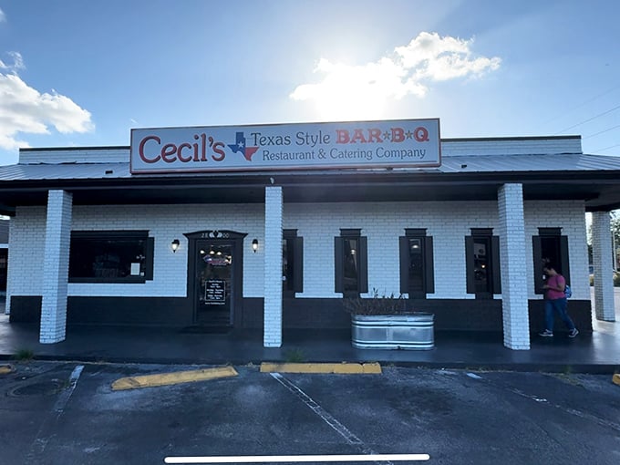 The unassuming white brick façade of Cecil's stands like a barbecue beacon on Orange Blossom Trail, promising smoky treasures within.