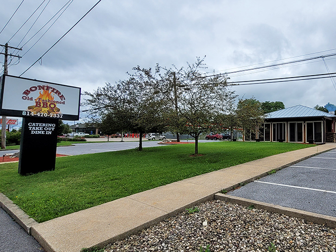 Don't let the modest exterior fool you—this unassuming building houses smoky treasures that would make any barbecue pilgrim weep with joy.