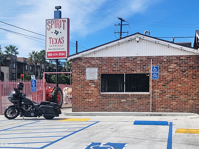 Unassuming brick façade hiding barbecue greatness—like finding a Rolex in a paper bag. The motorcycle out front tells you it's worth the pilgrimage.