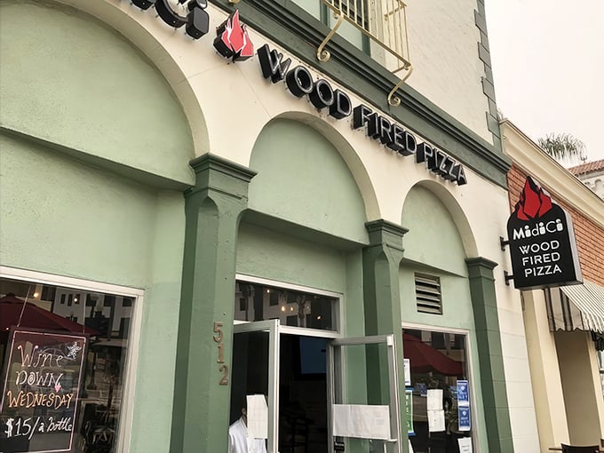The mint-green façade of MidiCi beckons pizza lovers like a siren song on Ventura's Main Street. Simplicity with style.