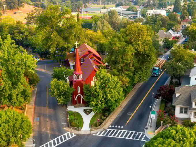 St. James Episcopal Church's vibrant red steeple stands like an exclamation point in Sonora's skyline, announcing "History lives here!" with architectural enthusiasm.