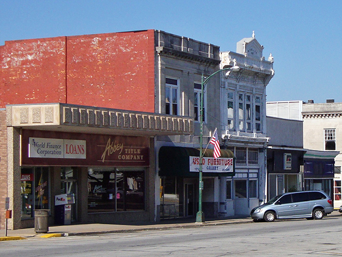 Historic storefronts line Carthage's square like architectural time travelers, their ornate facades whispering stories of bygone prosperity while sheltering modern businesses.