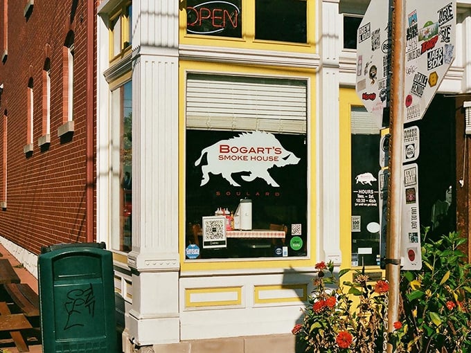 The bright yellow trim on this historic Soulard brick building isn't just cheerful—it's a beacon calling hungry pilgrims to the promised land of perfect barbecue.